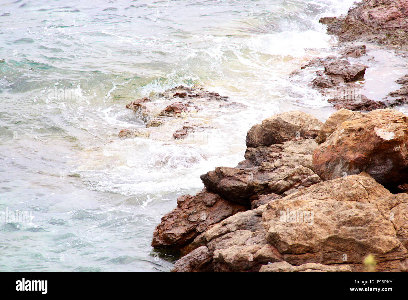 Waves on the Greek seashore Aegean sea Stock Photo - Alamy