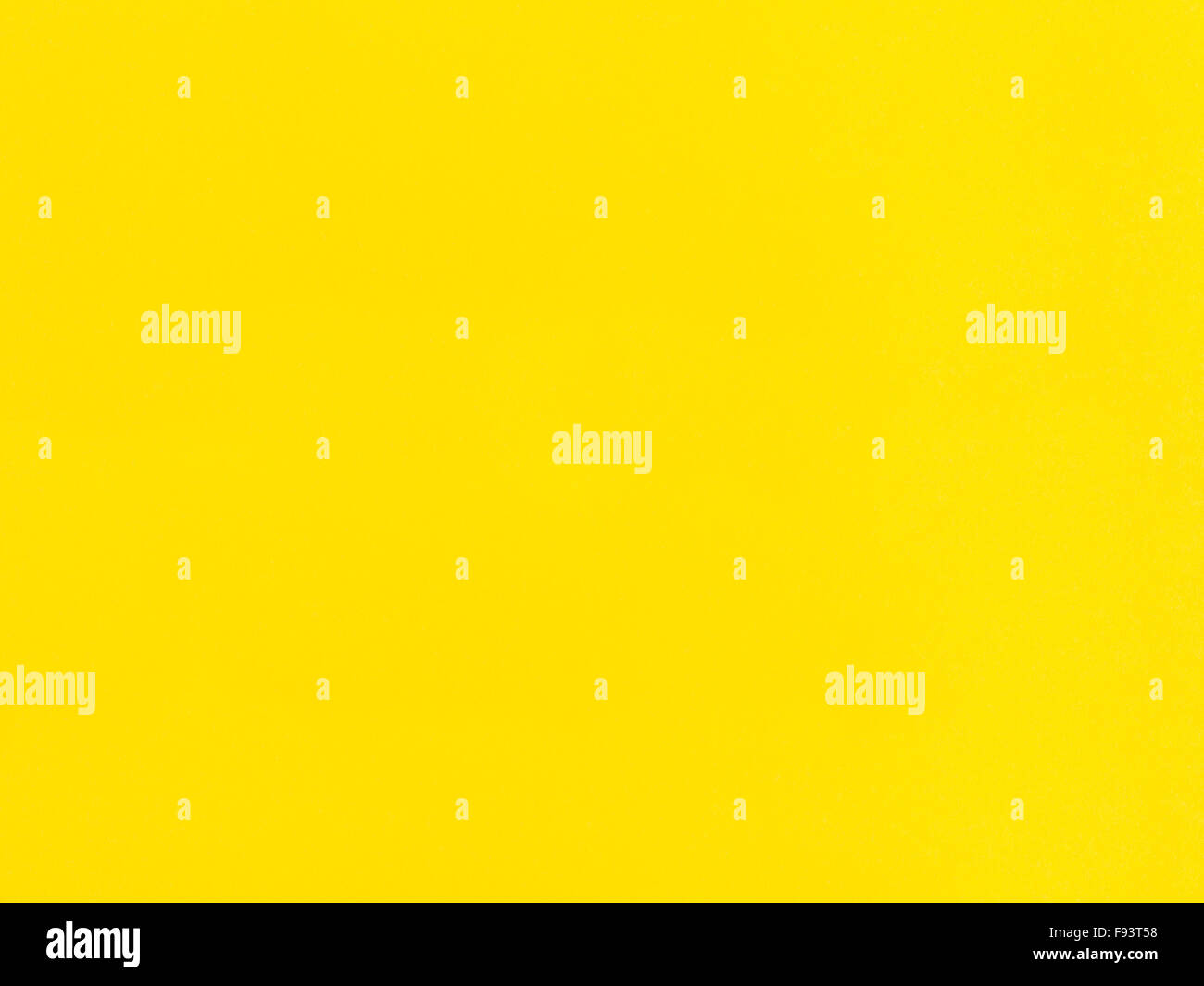 background from yellow colored sheet of paper Stock Photo - Alamy