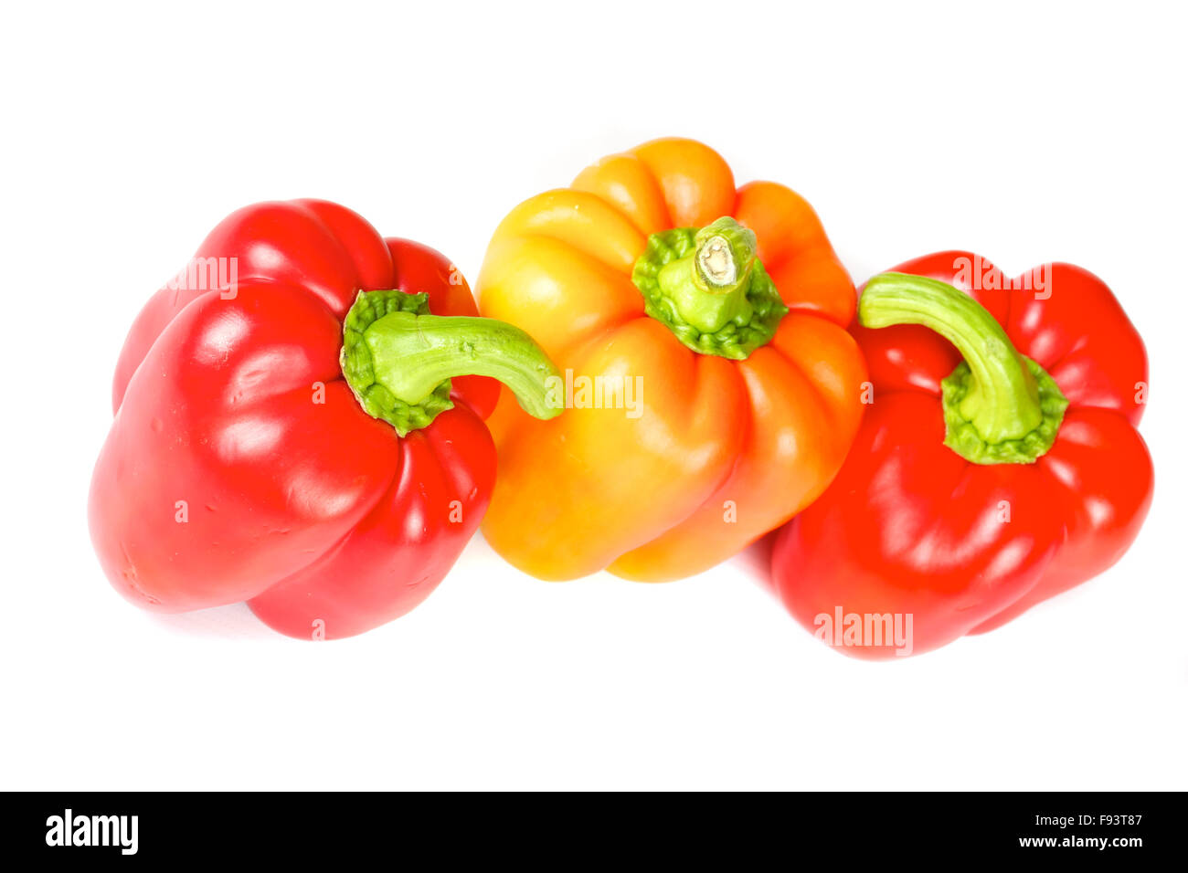 Orange and red pepper isolated on white background Stock Photo - Alamy