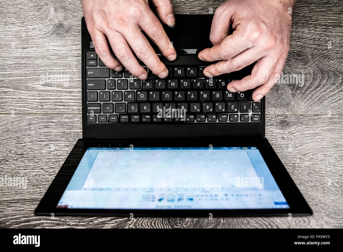 laptop with hands on wood Stock Photo - Alamy