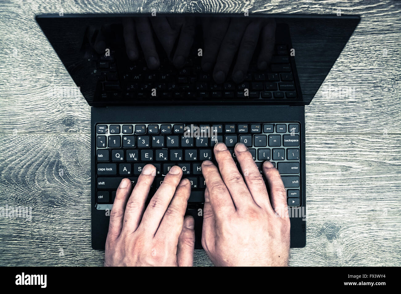 laptop with hands on wood Stock Photo - Alamy