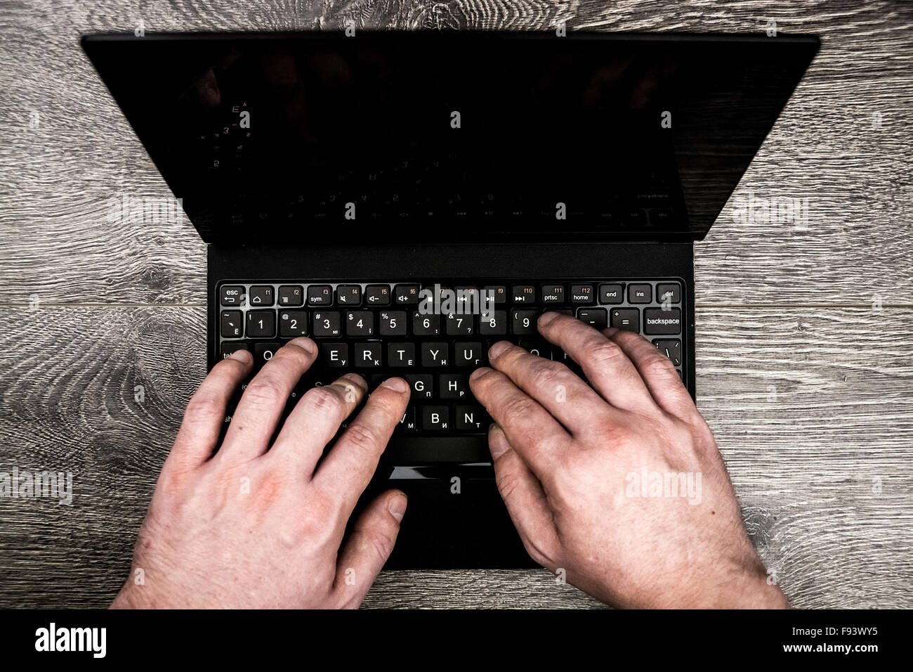 laptop with hands on wood Stock Photo - Alamy