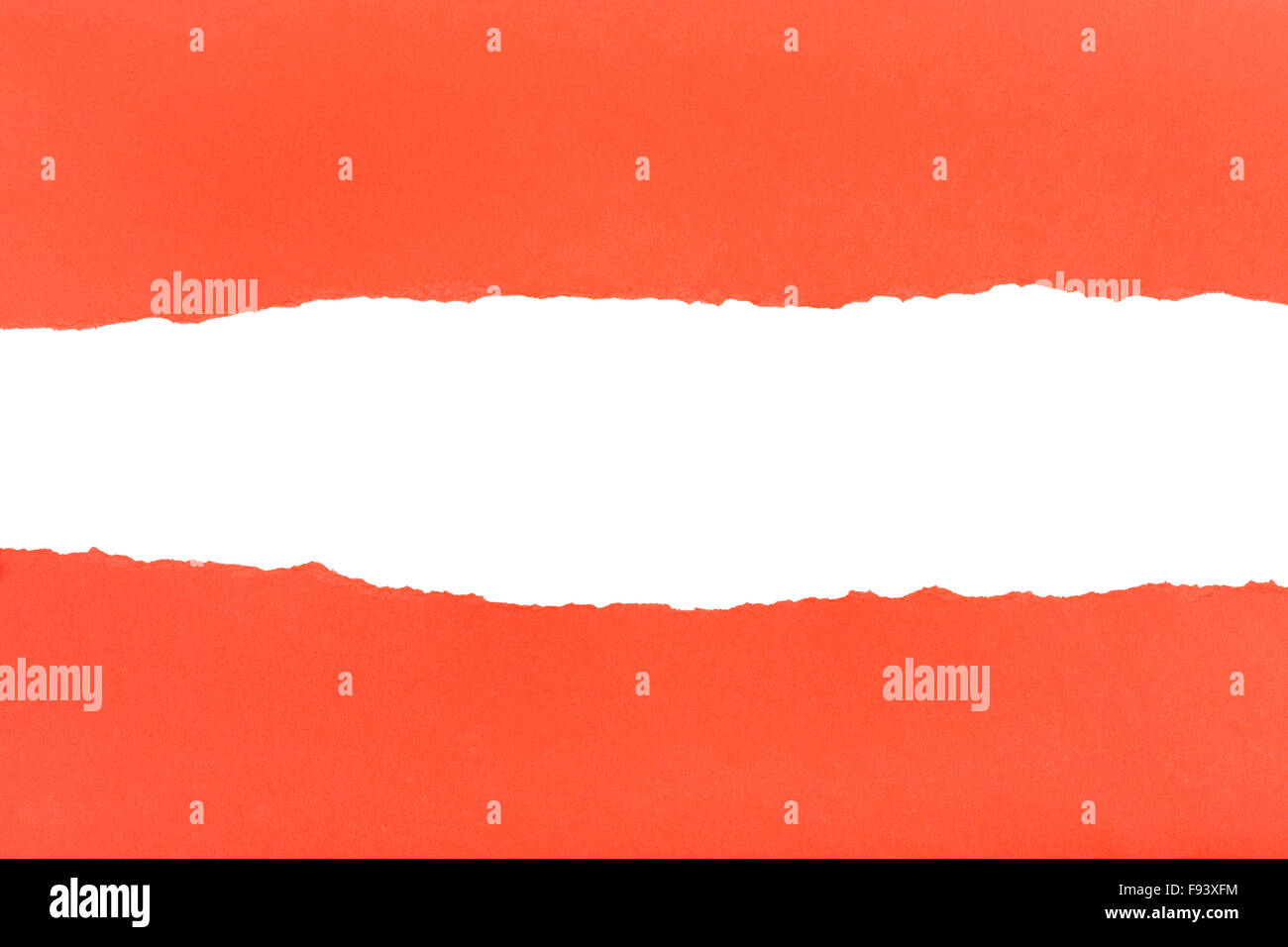 divided halves of the sheet of red ripped paper on white background ...