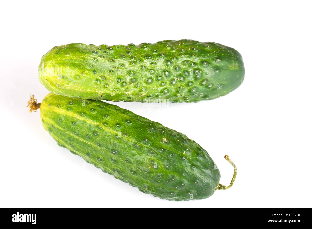 two cucumbers isolated on a white Stock Photo - Alamy