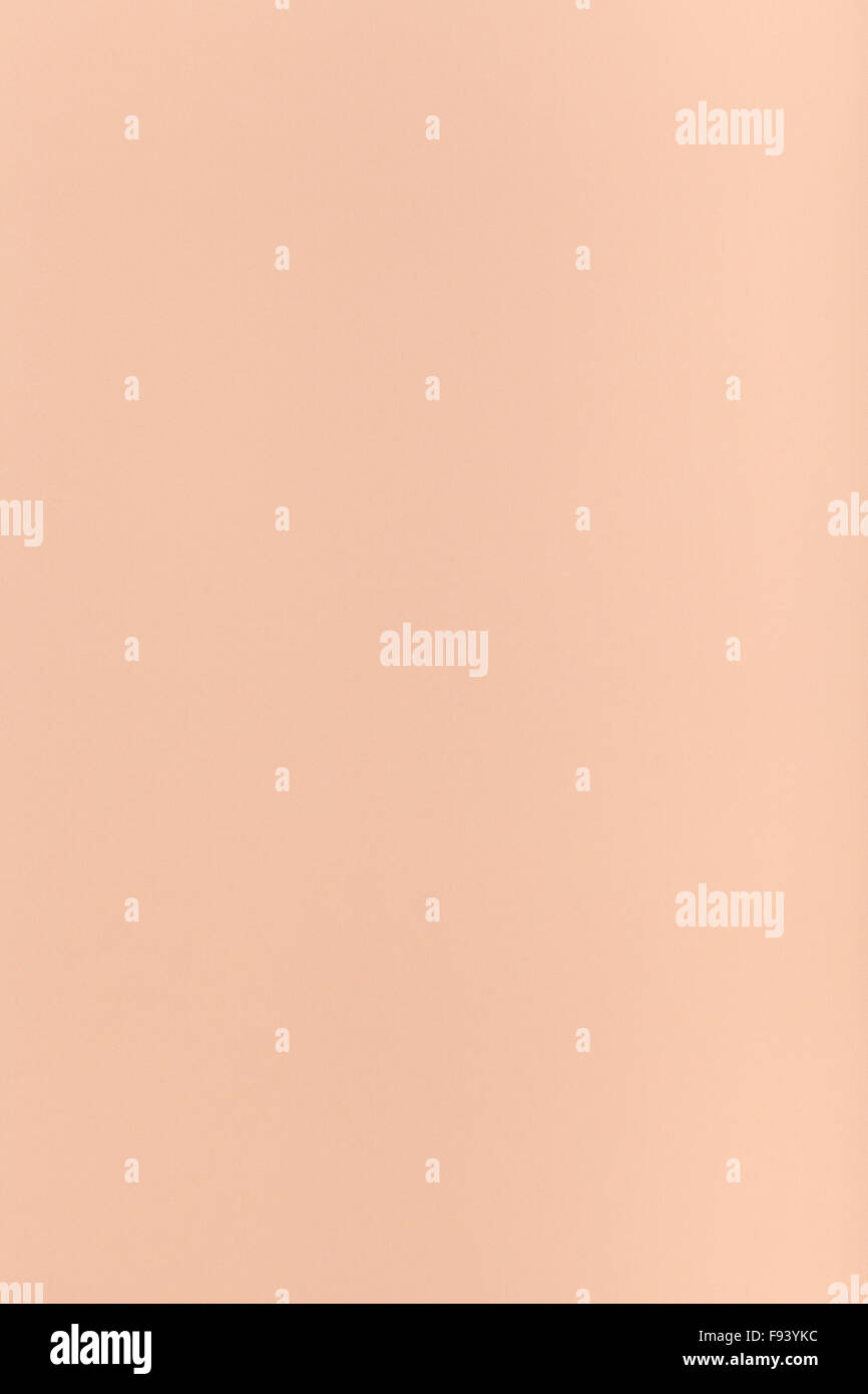 vertical background from peachy colored sheet of paper Stock Photo - Alamy