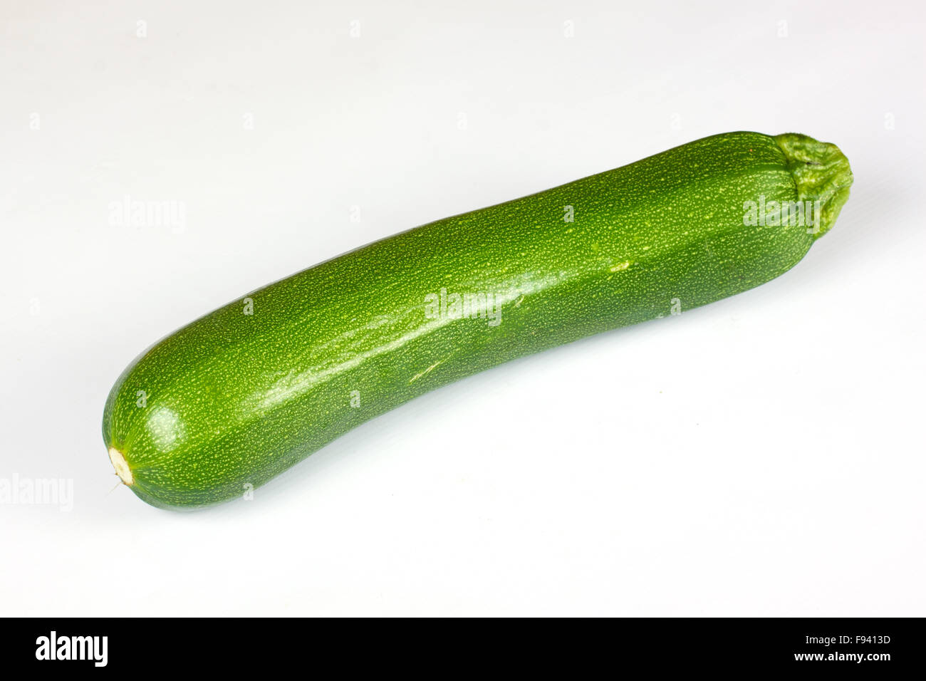 Courgette on white background isolated Stock Photo - Alamy