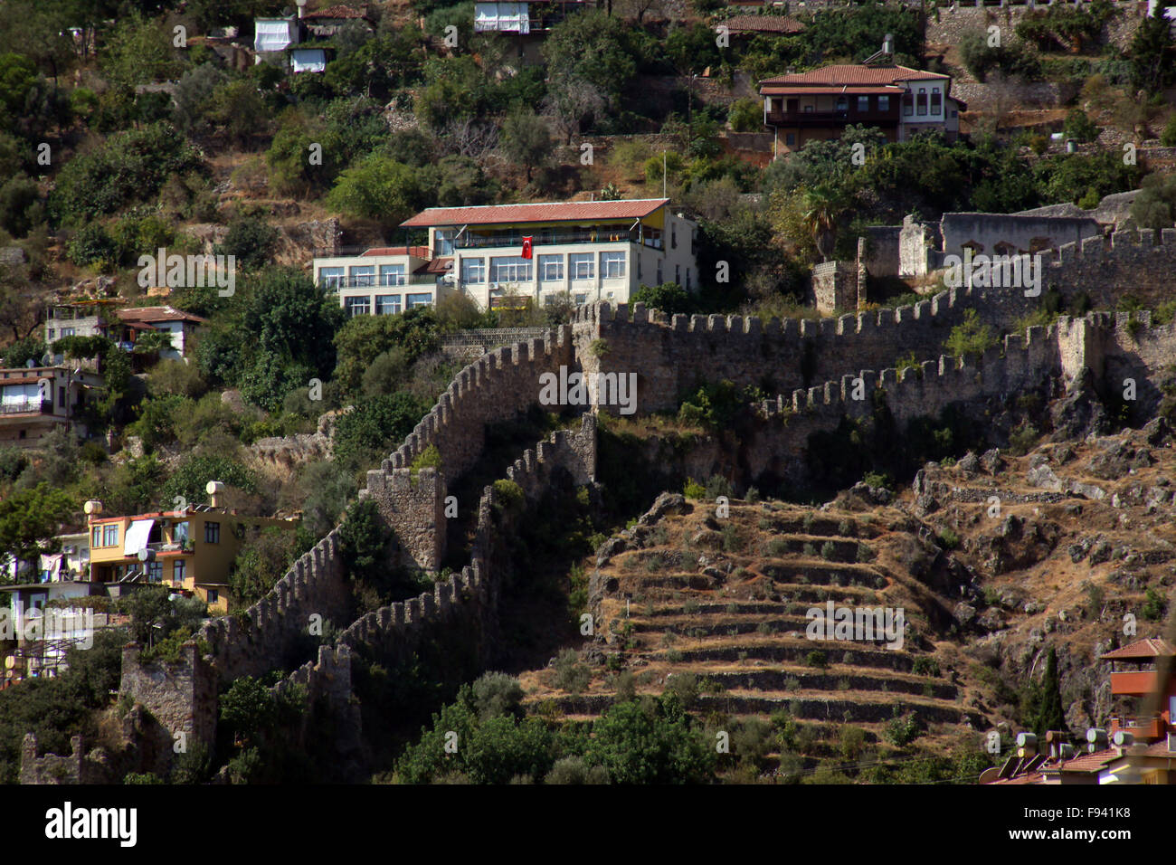 Port Alanya and red brick tower Stock Photo - Alamy