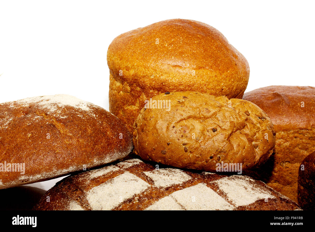 loafs of whole wheat and rye bread and isolated on white background ...