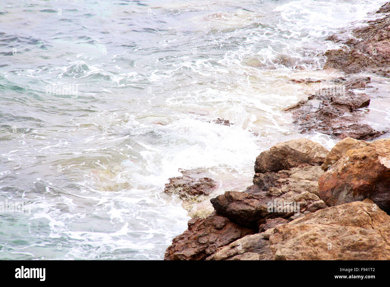 Waves on the Greek seashore Aegean sea Stock Photo - Alamy