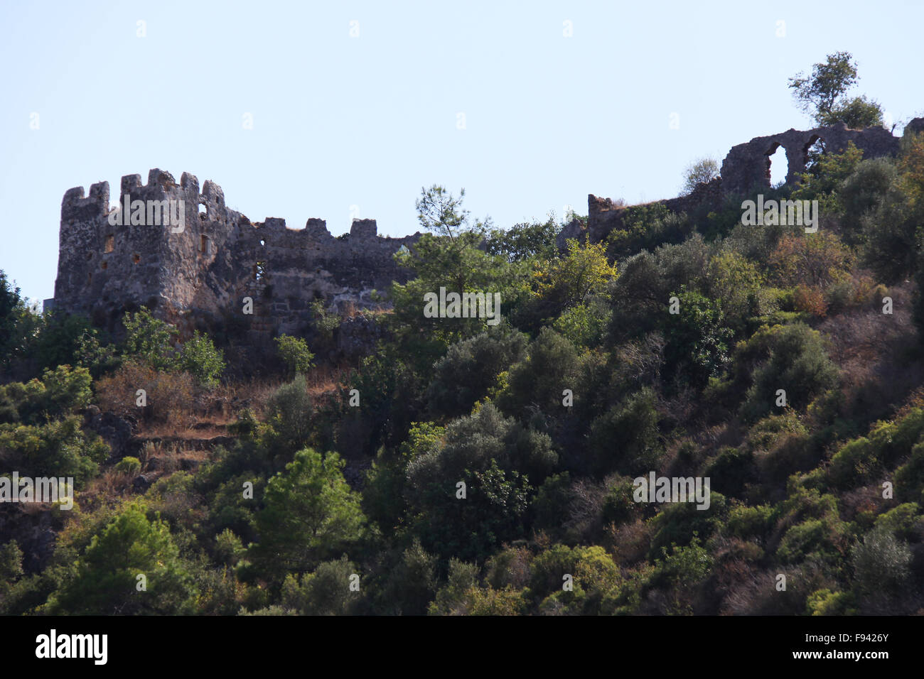 Port Alanya and red brick tower Stock Photo - Alamy