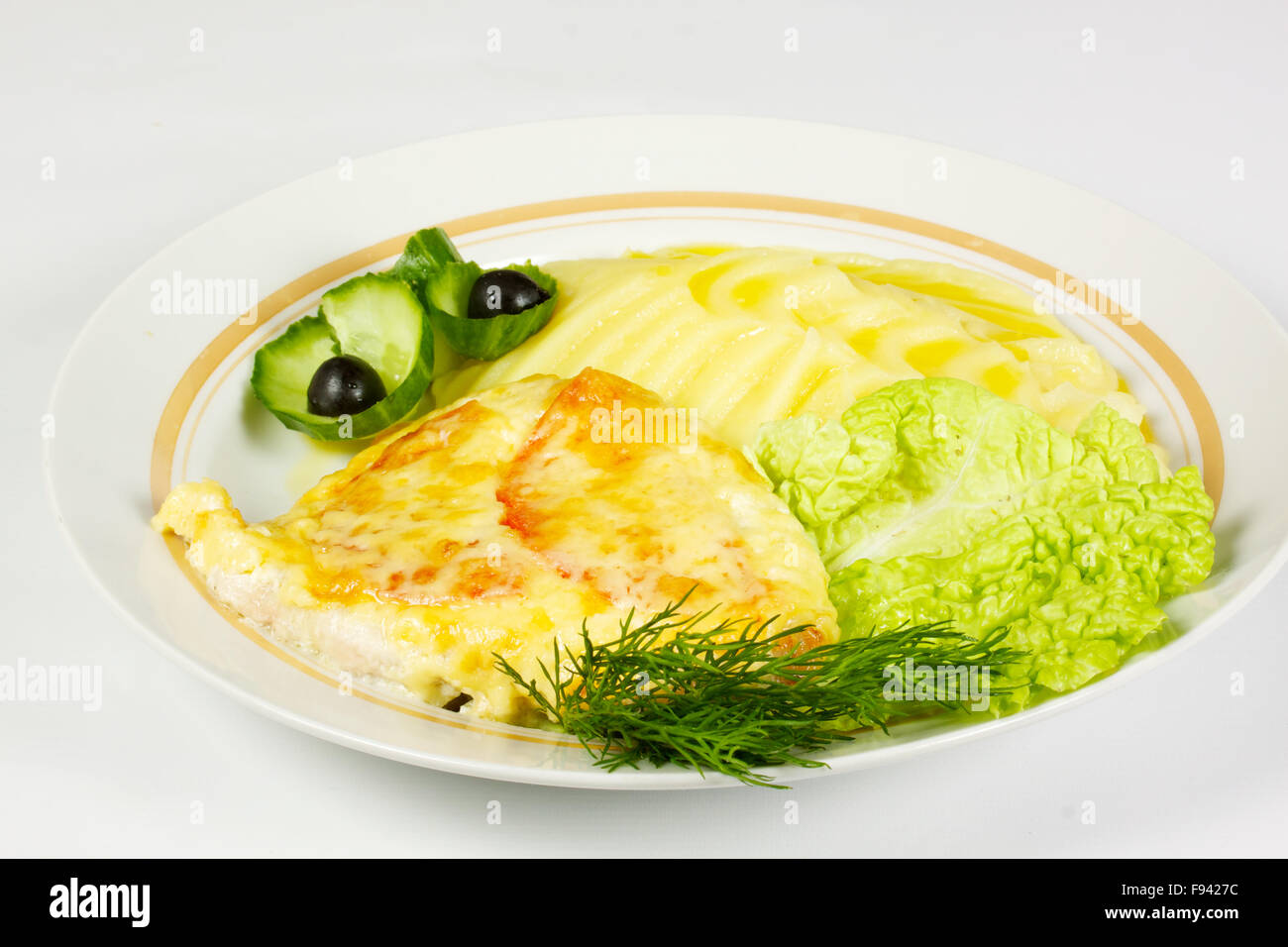 Ham and potato gratin on the white Stock Photo - Alamy