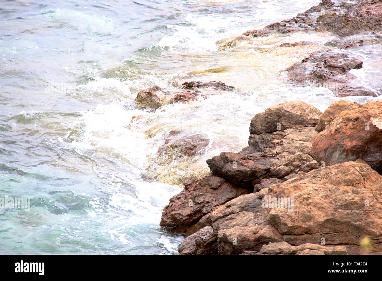 Waves on the Greek seashore Aegean sea Stock Photo - Alamy