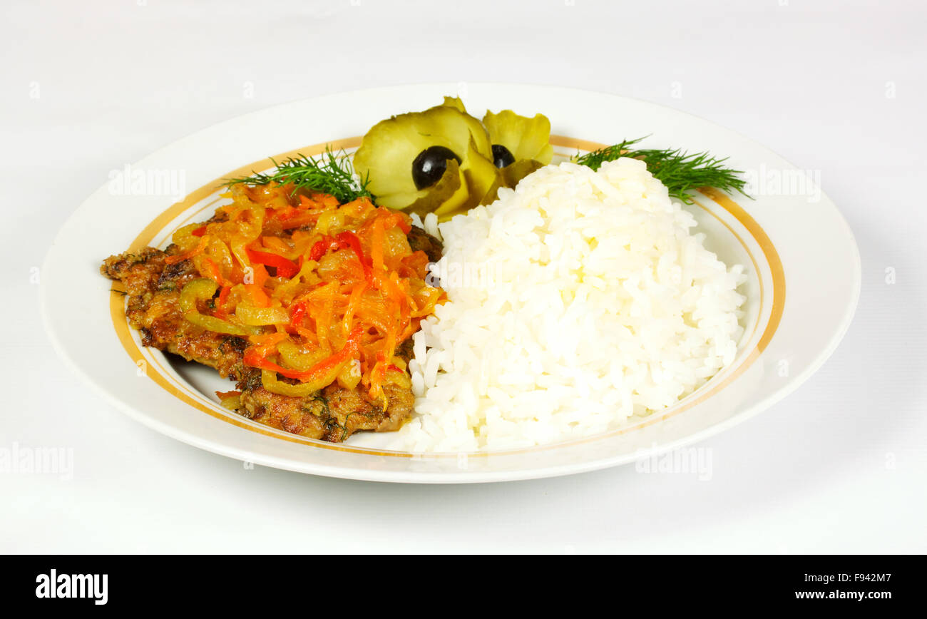 Fired meat, white rice and vegetables on the white Stock Photo - Alamy