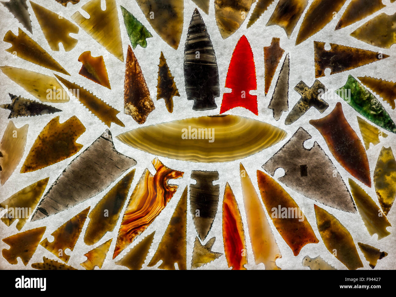 Hand-made stone arrowheads of various colors and shapes Stock Photo - Alamy