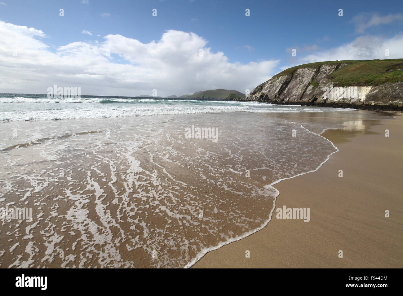 Incoming tide and Atlantic surf at Coumeenoole Beach, a long strand at ...
