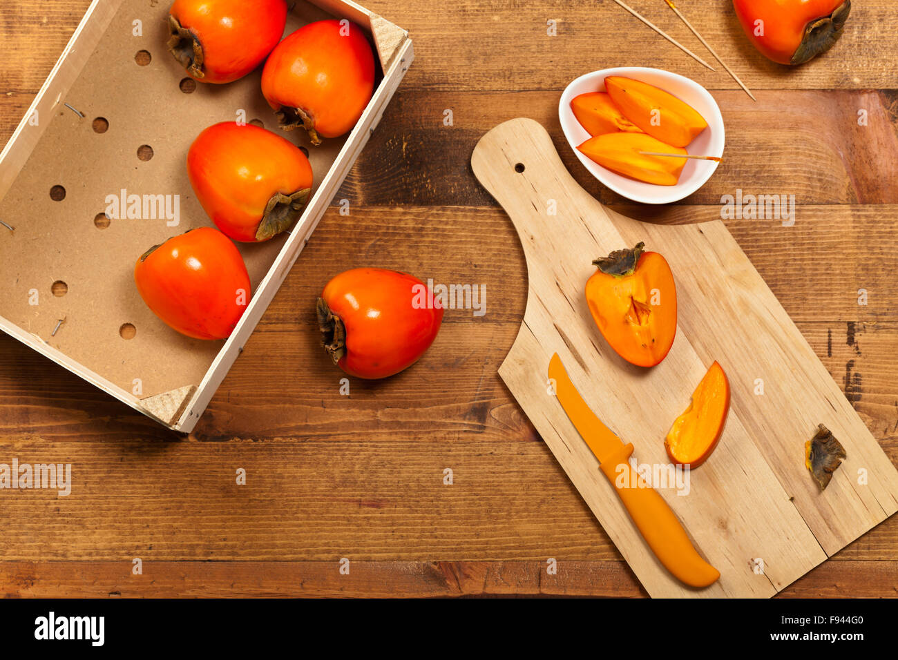 Box of persimmons hi-res stock photography and images - Alamy