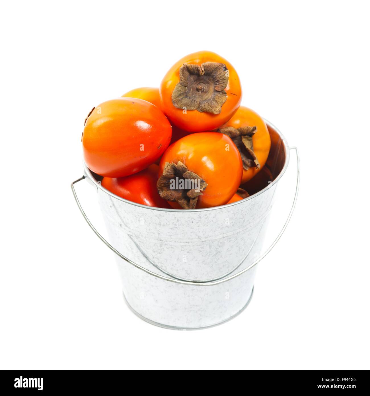 Orange persimmons hi-res stock photography and images - Alamy