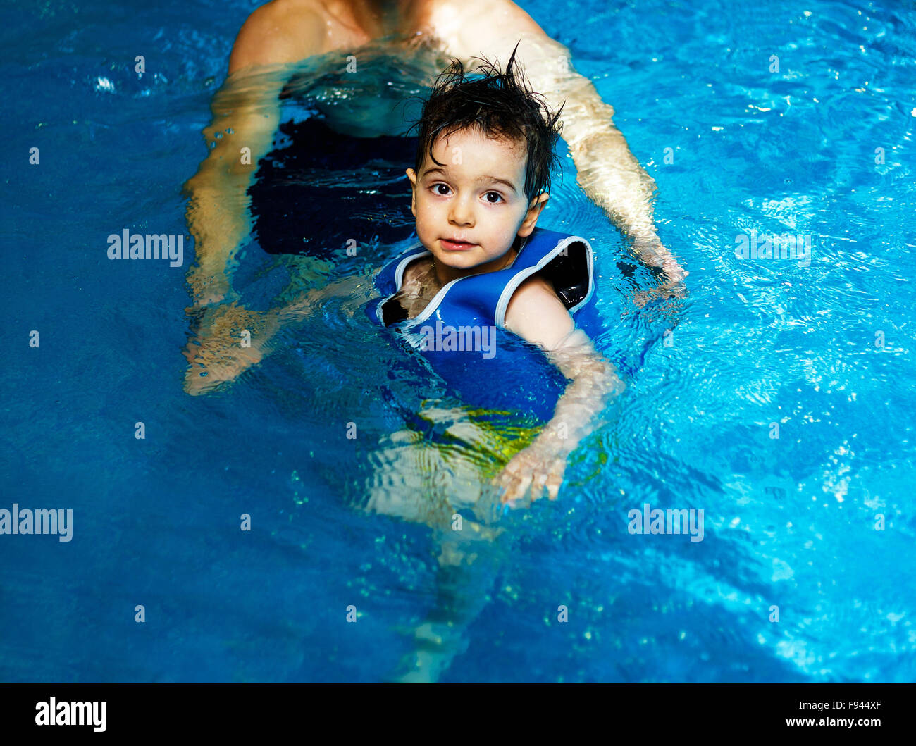 Man pool holding float hi-res stock photography and images - Alamy