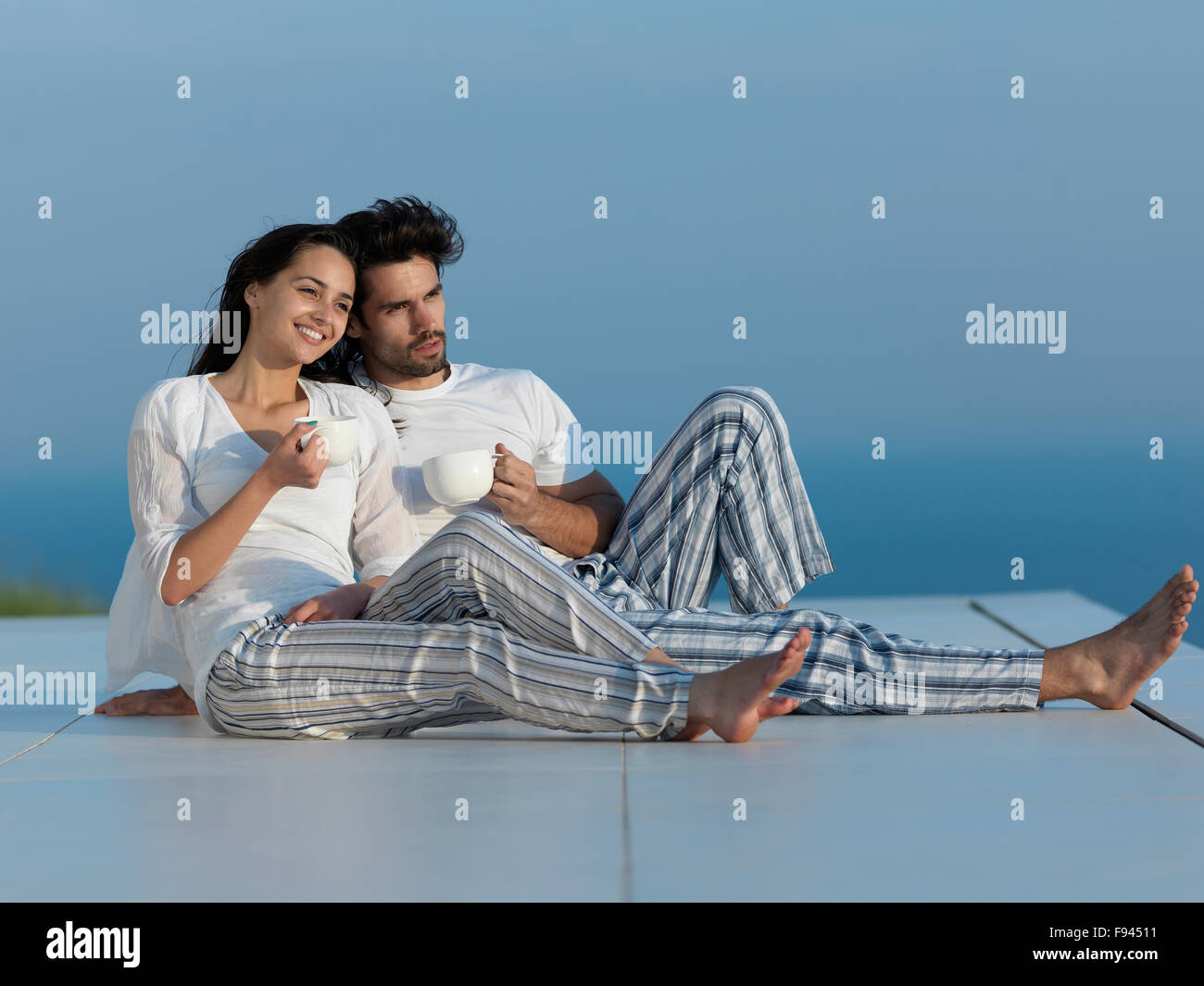 romantic happy young couple relax at modern home indoors Stock Photo ...