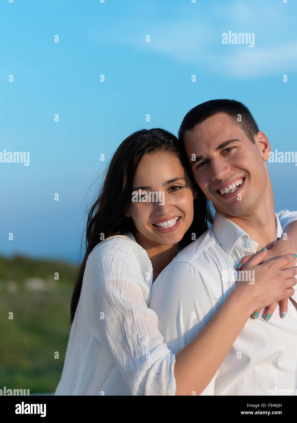 Happy Young Romantic Couple Have Fun Relax Smile At Modern Home Outdoor