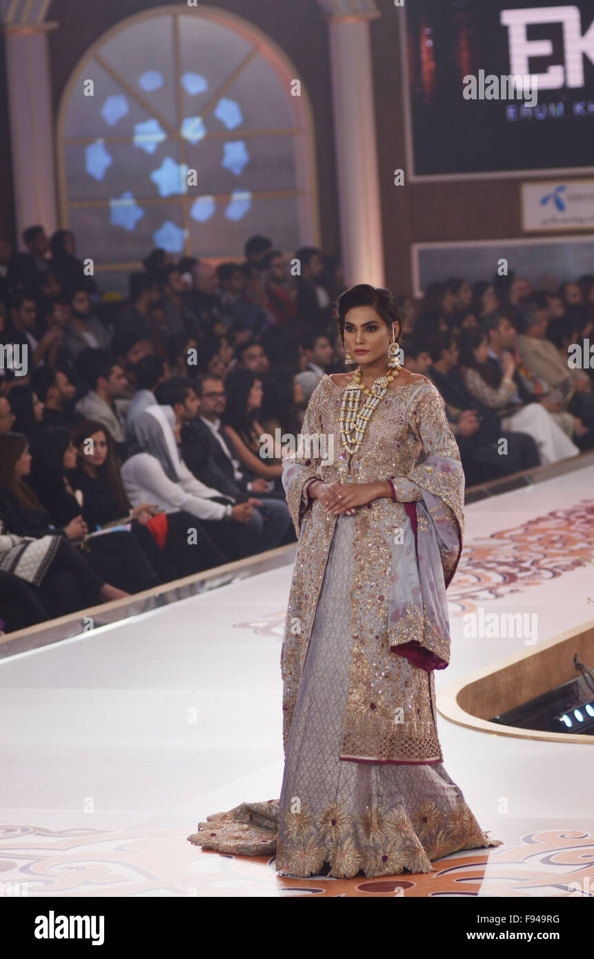 Lahore, Pakistan. 13th Dec, 2015. Pakistani model presents the creation ...