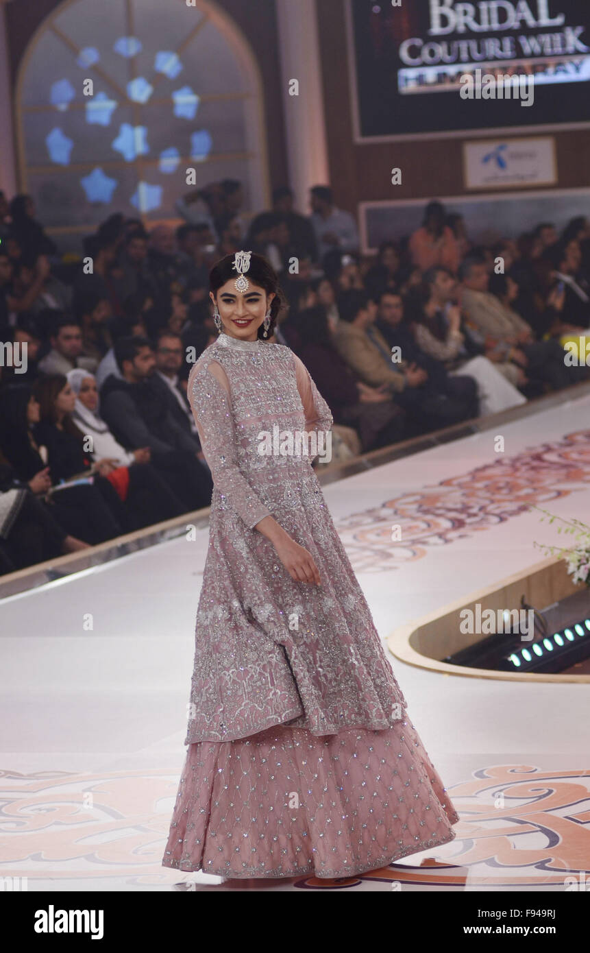 Lahore, Pakistan. 13th Dec, 2015. Pakistani model presents the creation ...