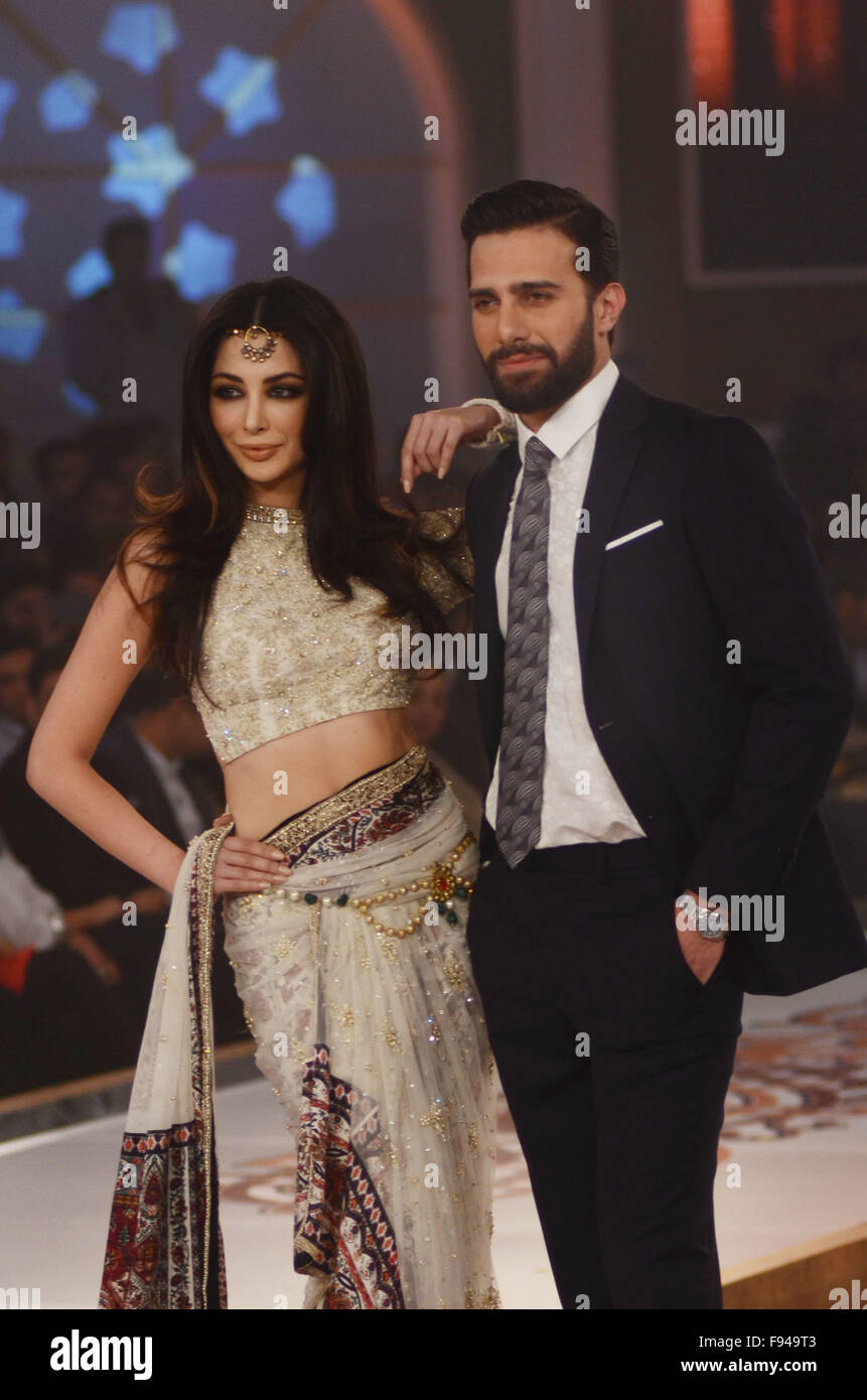 Lahore, Pakistan. 13th Dec, 2015. Pakistani models presents the ...