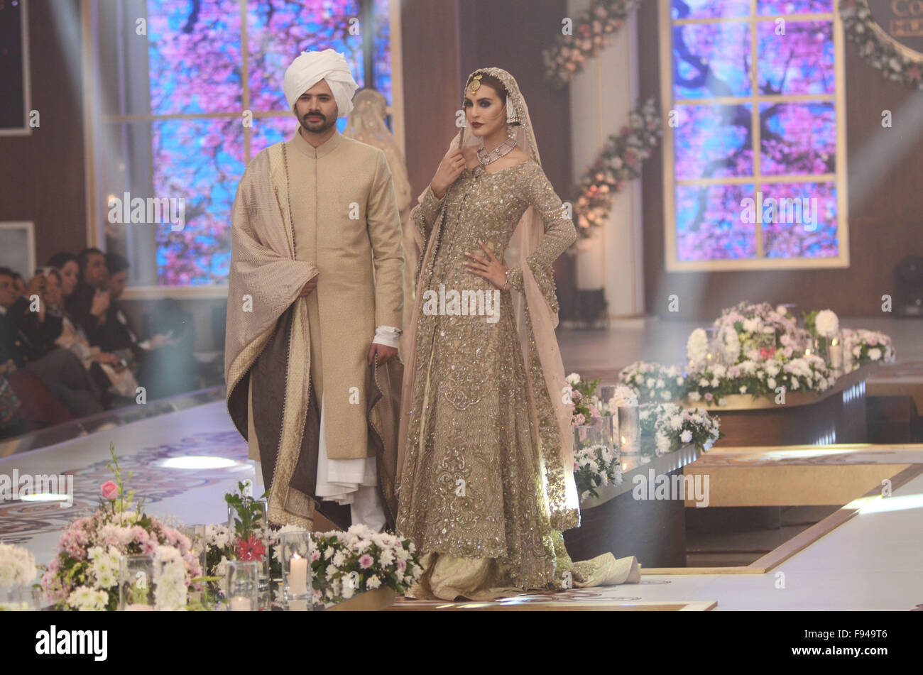 Lahore, Pakistan. 13th Dec, 2015. Pakistani models presents the ...