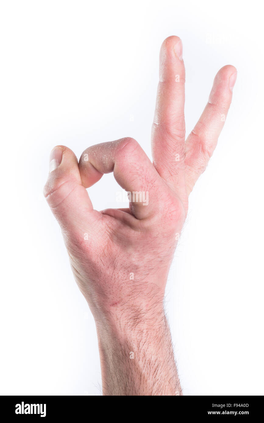 Man's hand miming OK on white background Stock Photo - Alamy