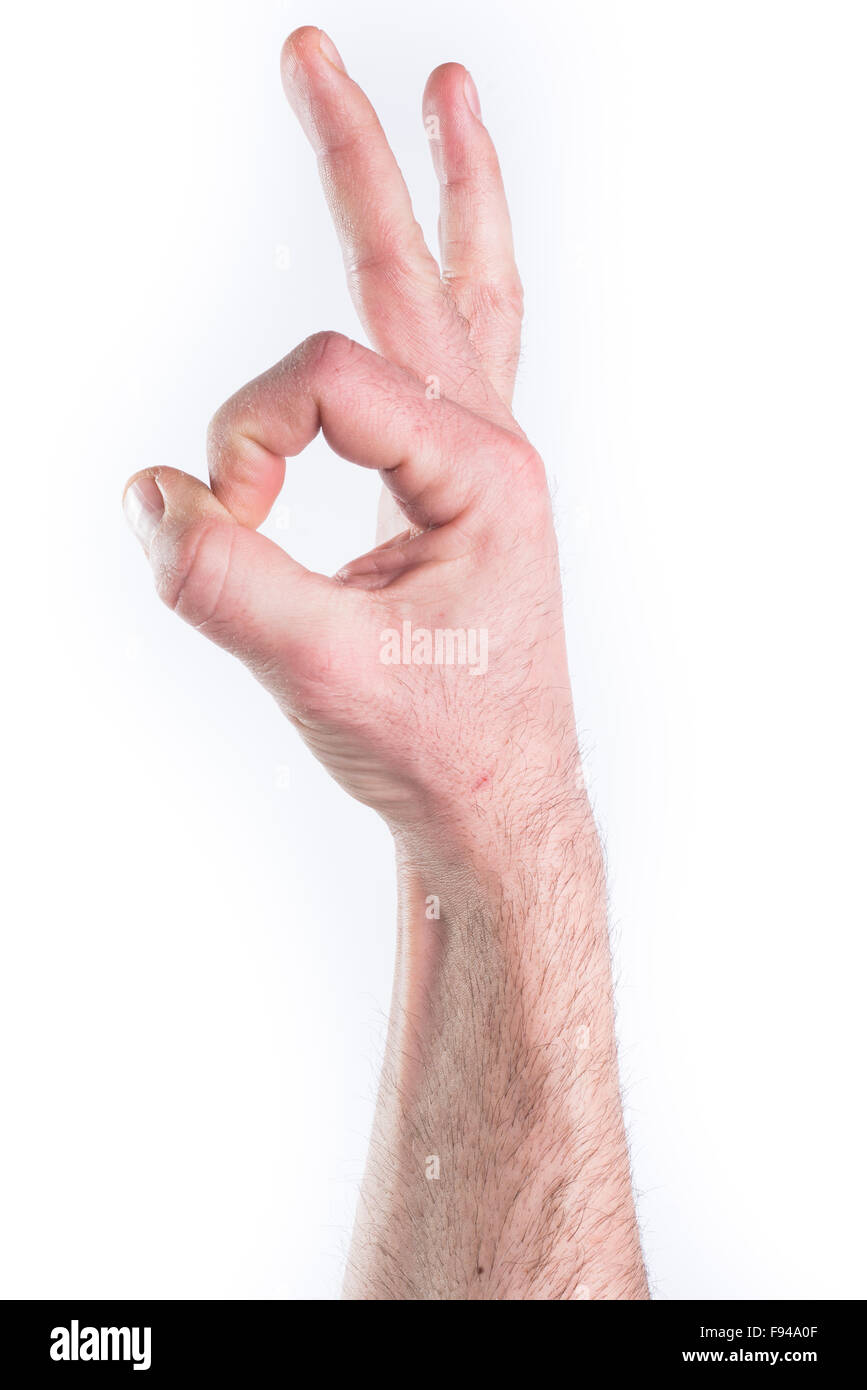 Man's hand miming OK on white background Stock Photo - Alamy