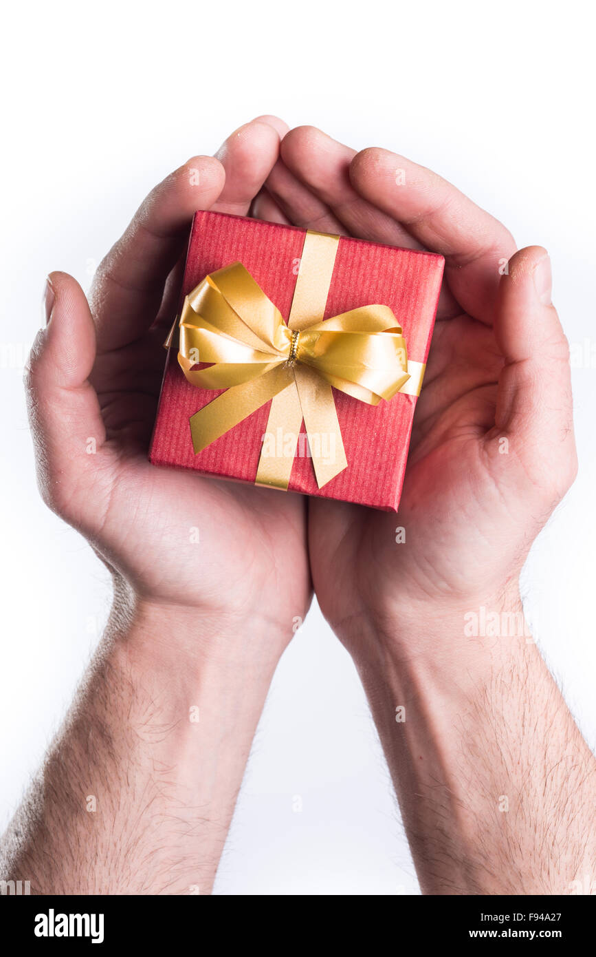 Concept hands giving gift on white background Stock Photo - Alamy