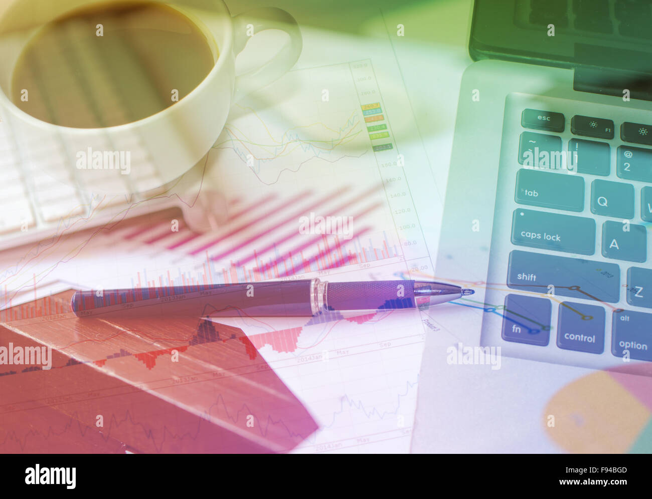 paper chart and computer on table.business concept Stock Photo - Alamy