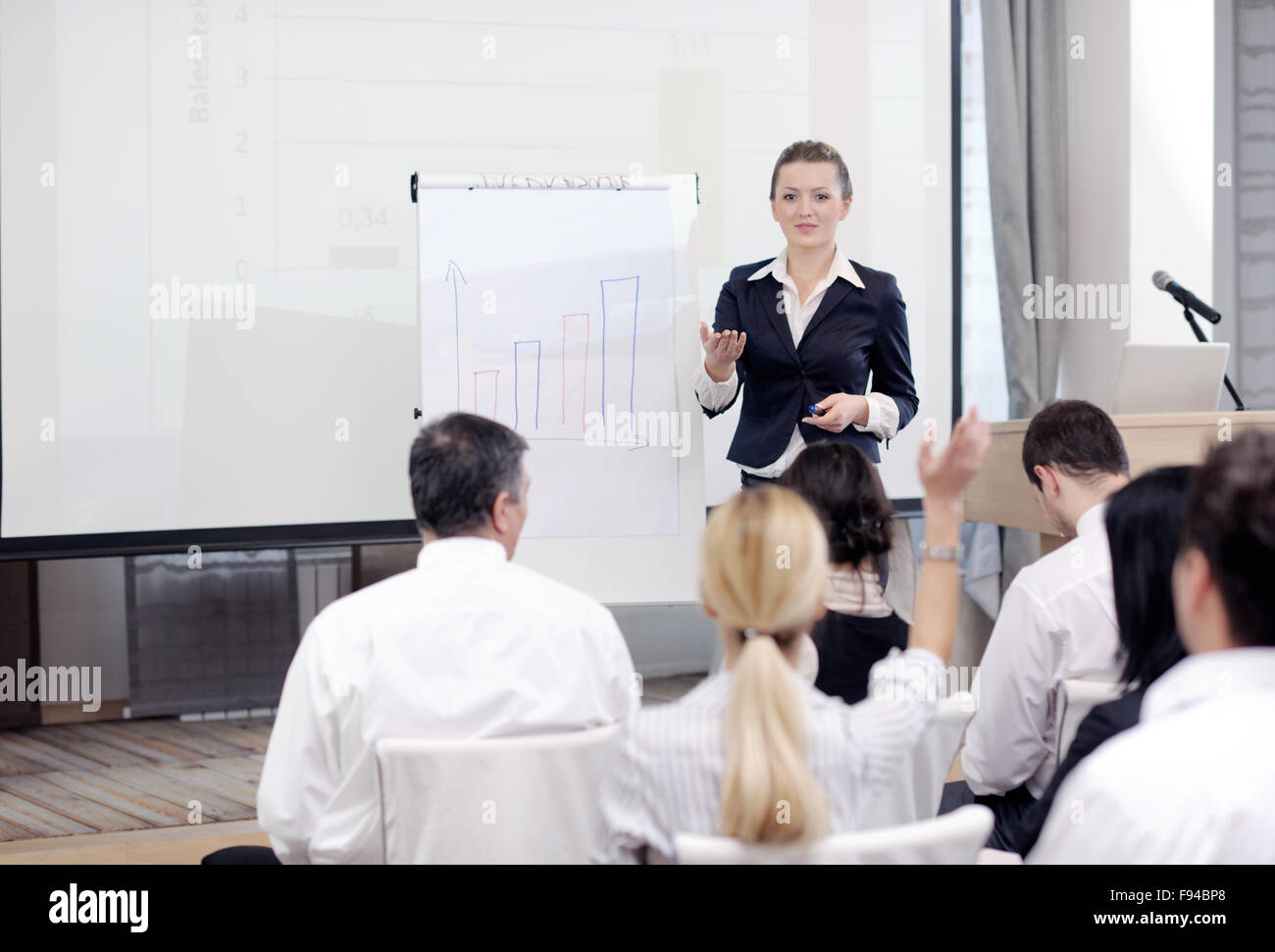 business people group at meeting seminar presentation in brigt ...