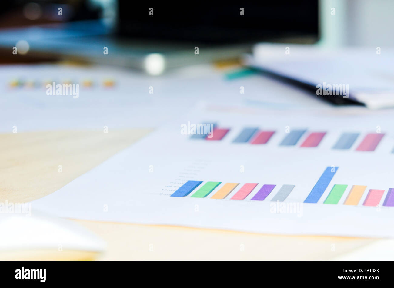 Graphs and charts, business table. The workplace of business people ...