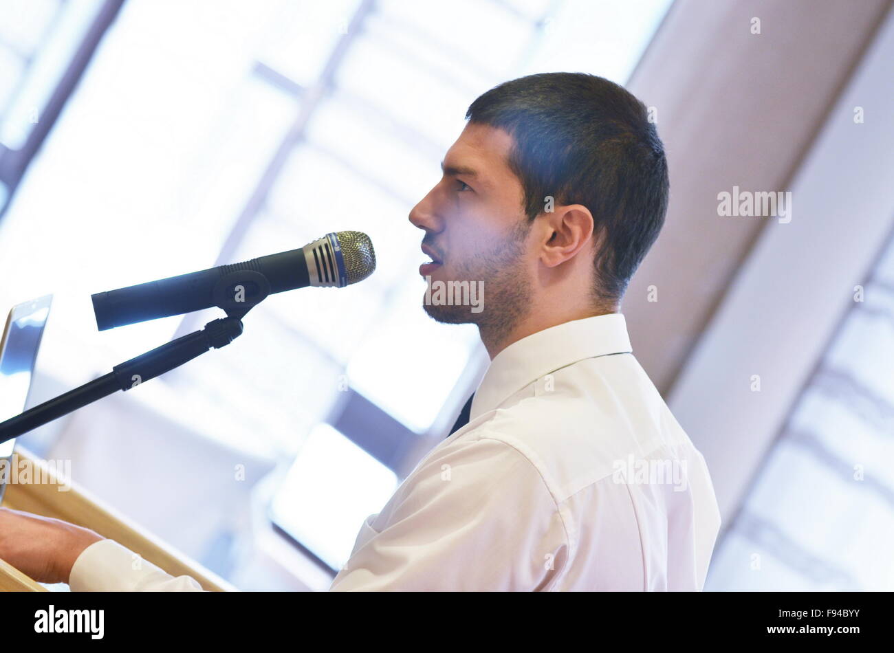 young male business man giving a presentation at a meeting seminar at ...