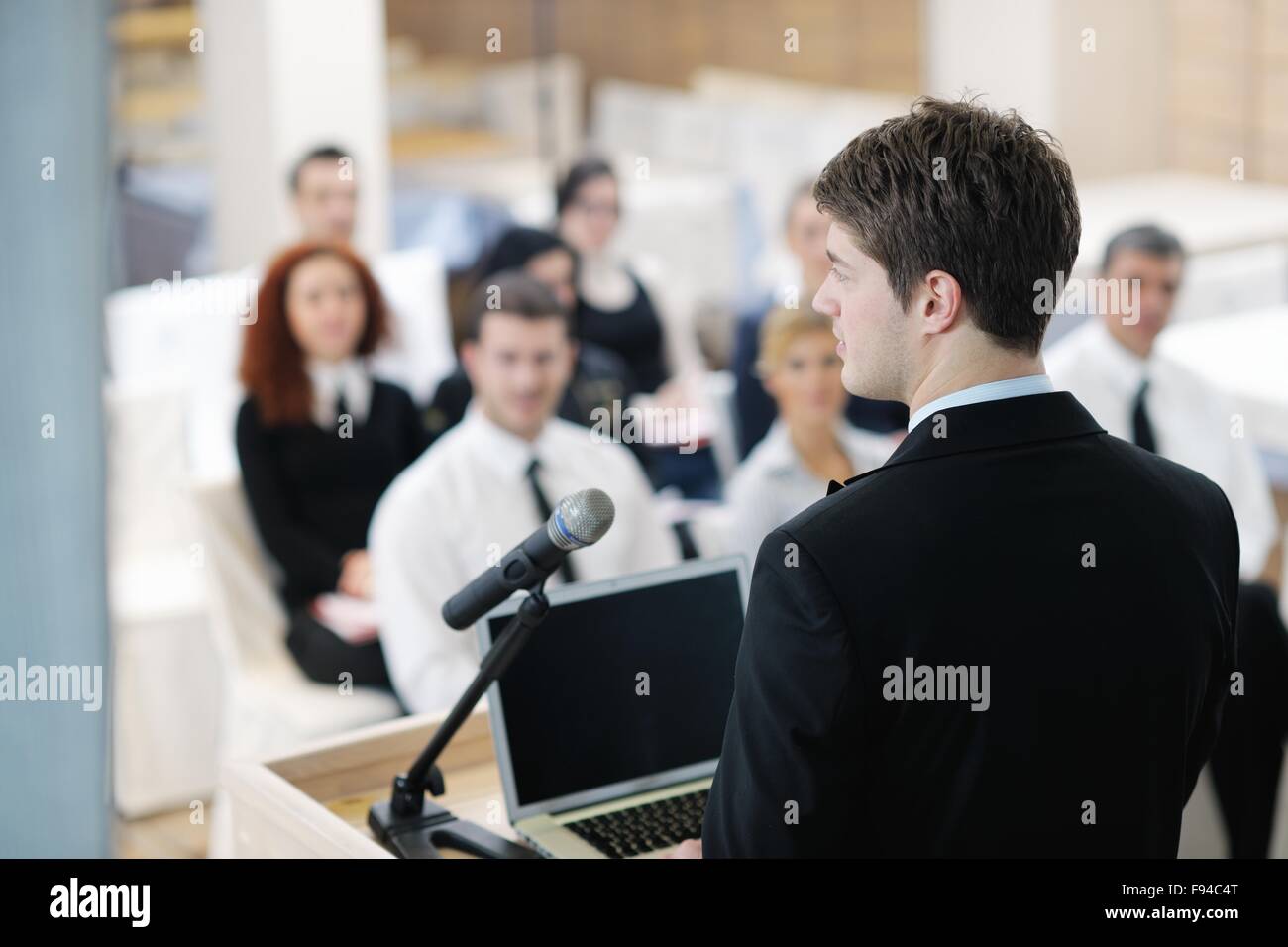 young male business man giving a presentation at a meeting seminar at ...