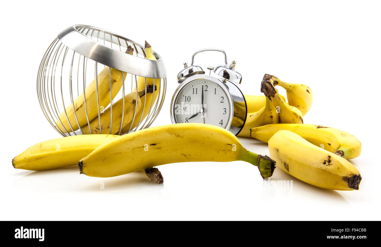 Banana Time clock with bananas on white background Stock Photo - Alamy