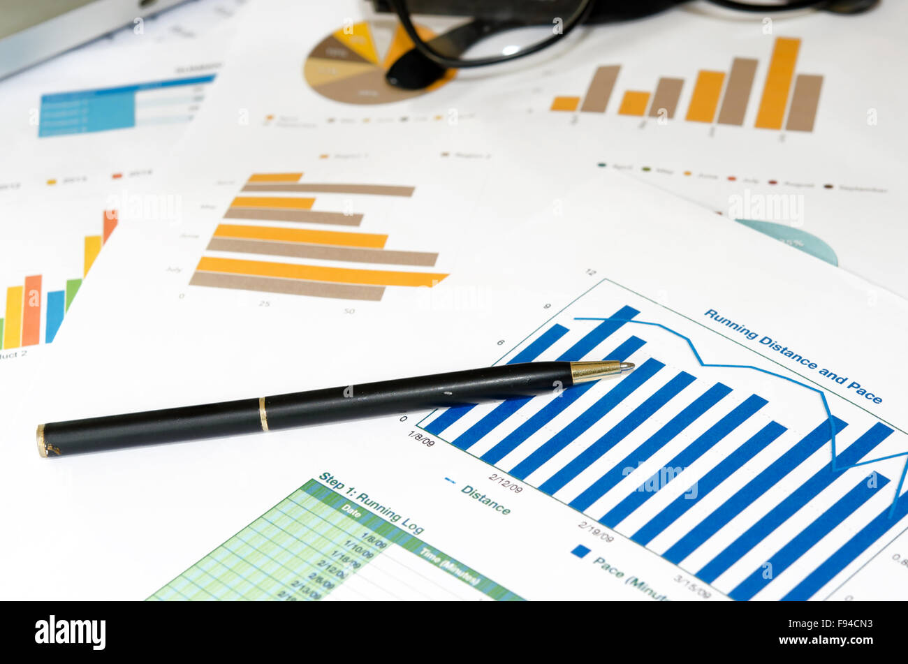 Graphs and charts, business table. The workplace of business people ...
