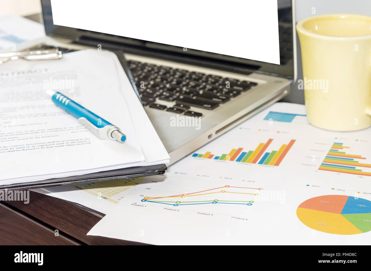 Financial paper charts and graphs on the table Stock Photo - Alamy