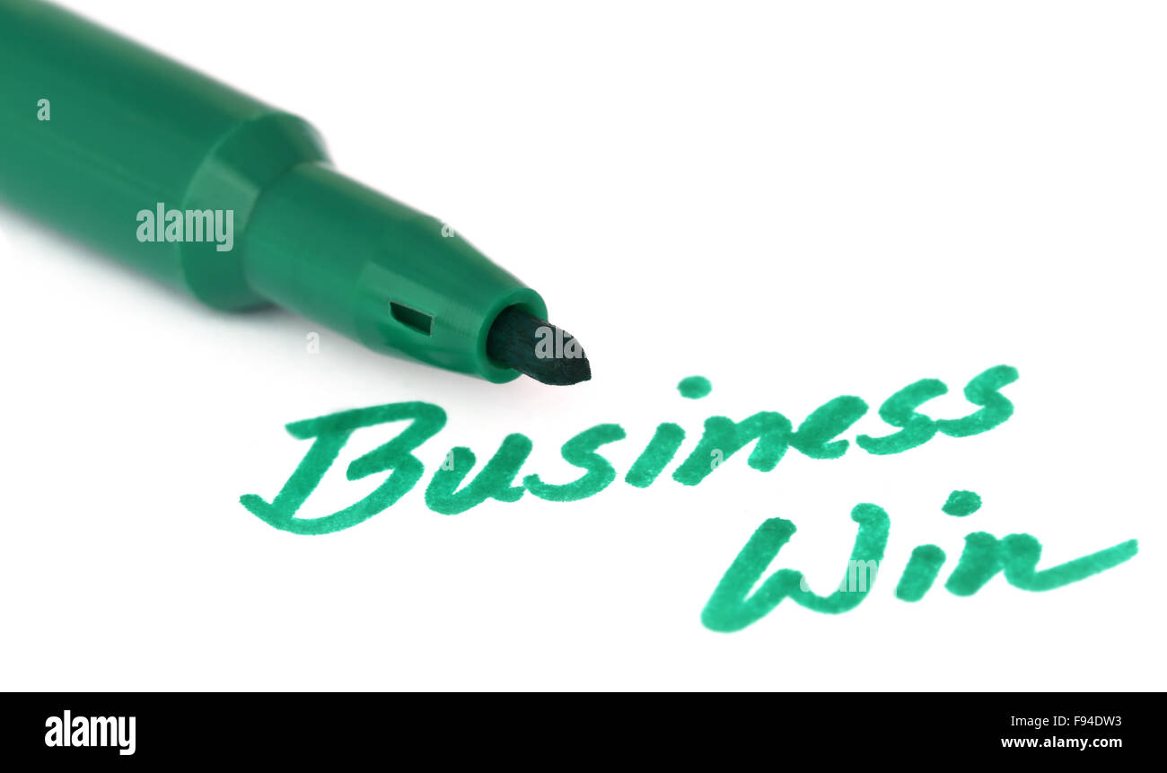 Win written curve on a paper with pen over white background Stock Photo ...