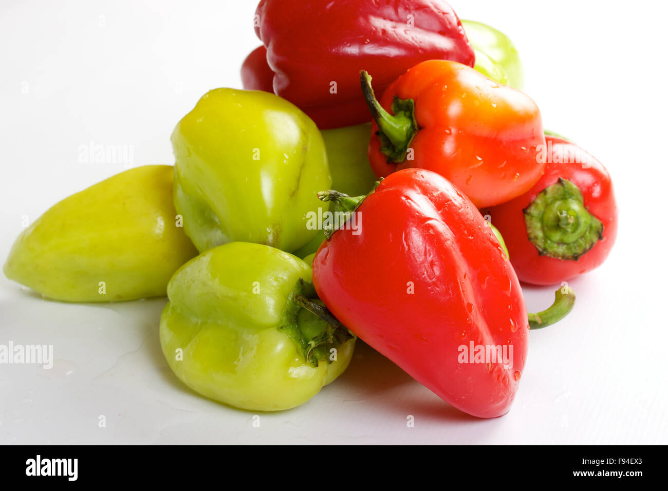 Bell pepper mix on the white background Stock Photo - Alamy