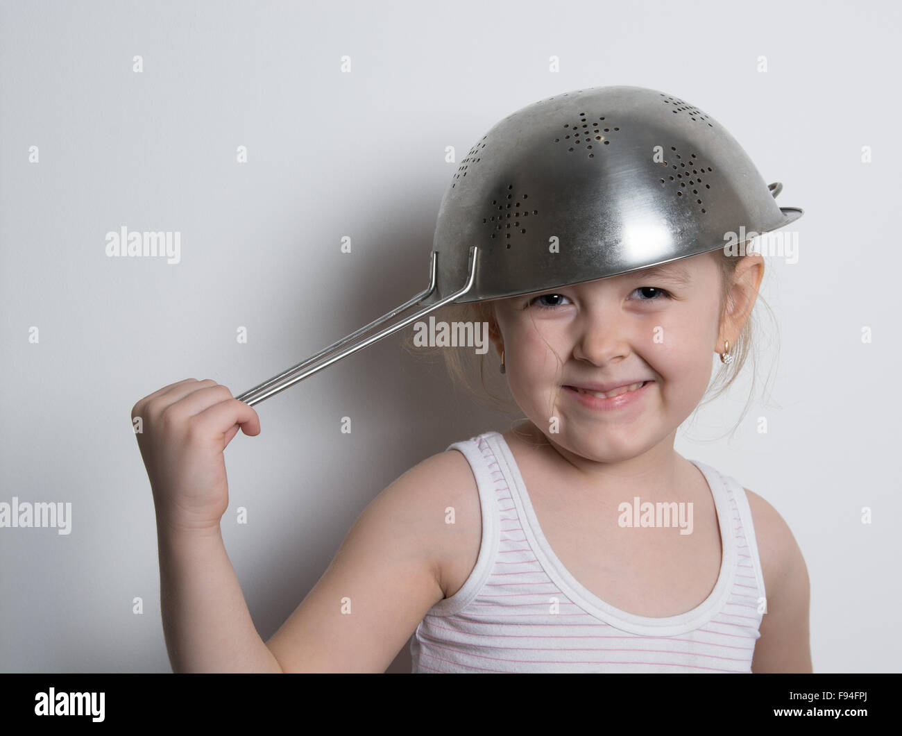 girl with a pot on his head Stock Photo - Alamy