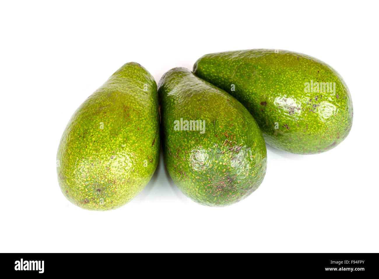 Ripe green avocado. Isolated on white background Stock Photo - Alamy