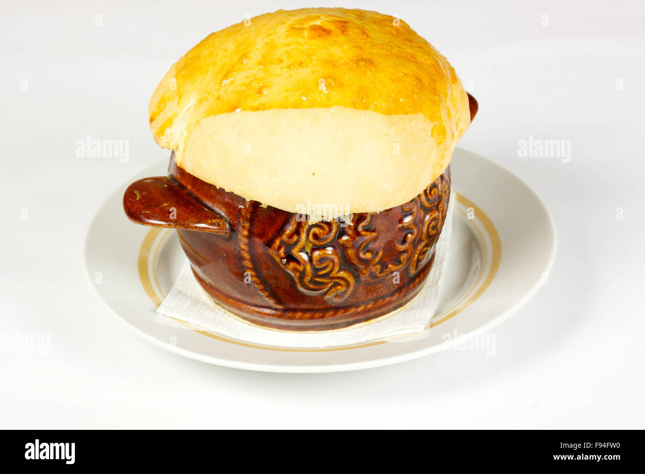 Soup in a bread pot on an isolated background Stock Photo - Alamy