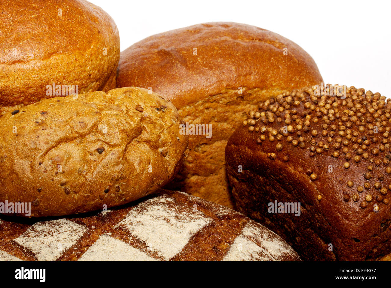 loafs of whole wheat and rye bread and isolated on white background ...