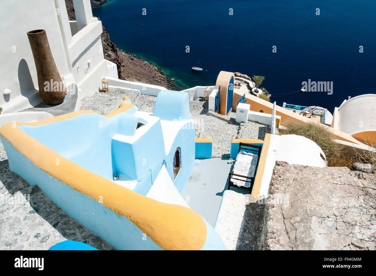 Santorini, Thira. High angle view looking down town stone steps ...