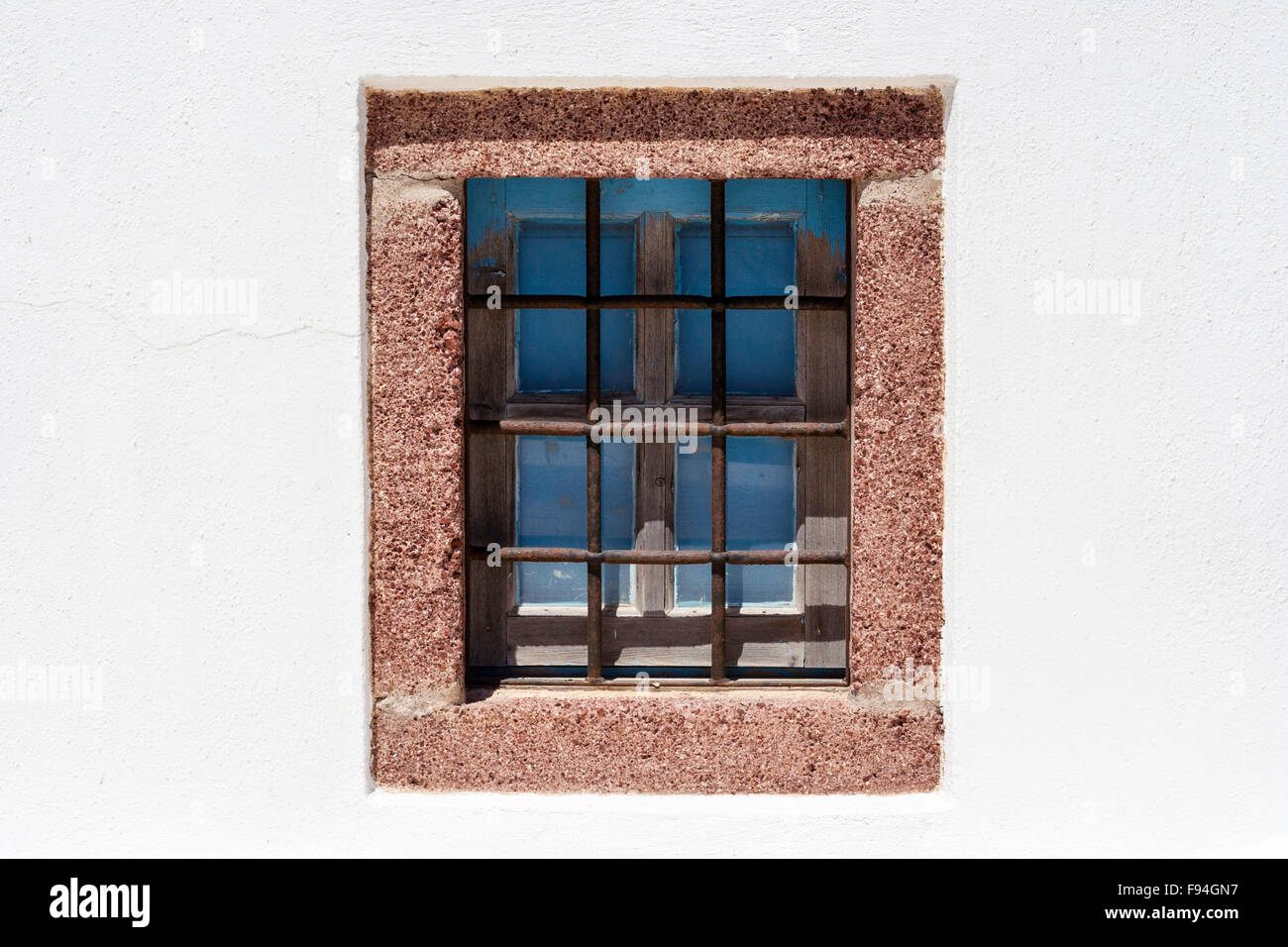 Cyclades, Santorini, Thira. Close up of house whitewashed wall with ...