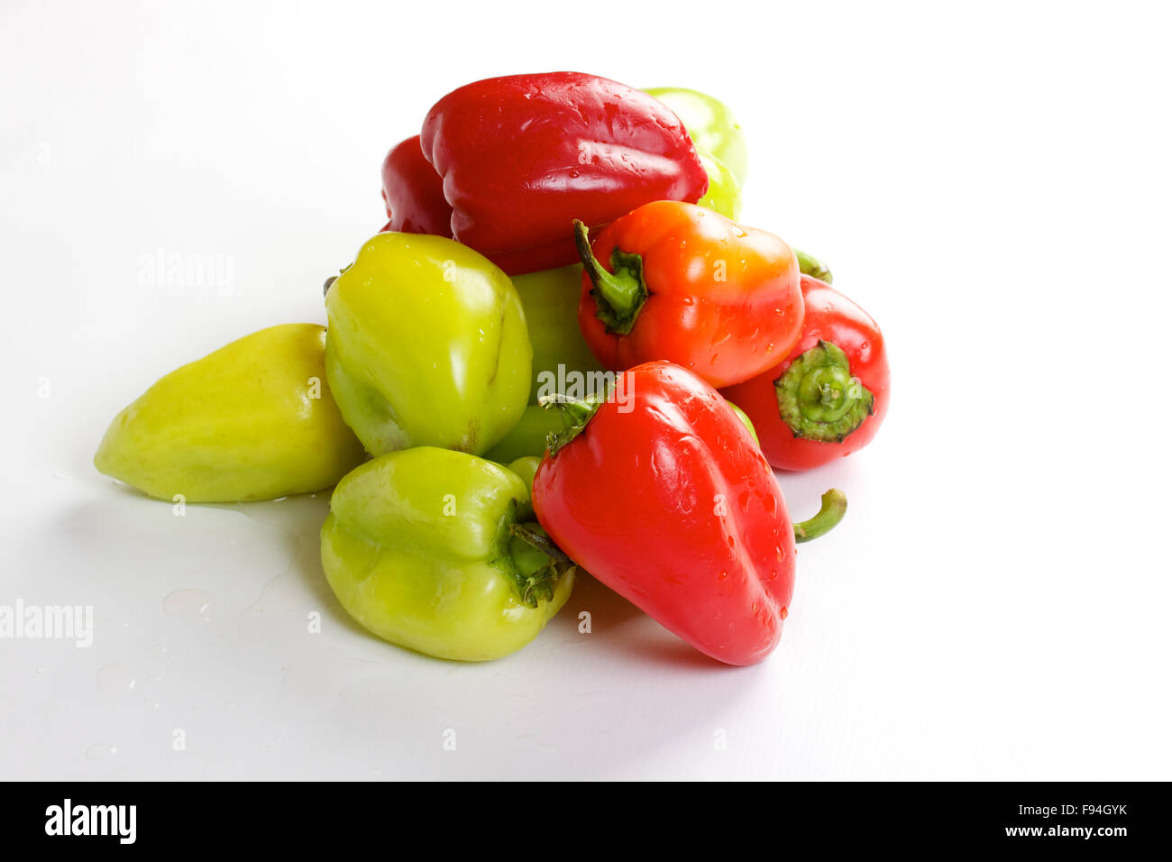 Bell pepper mix on the white background Stock Photo - Alamy