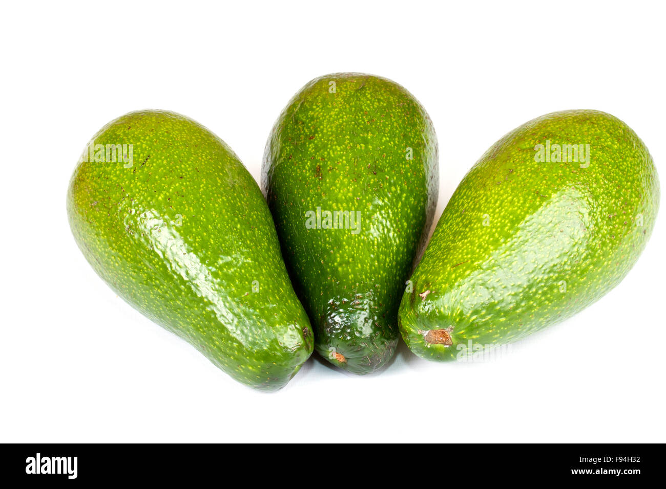Ripe green avocado. Isolated on white background Stock Photo - Alamy