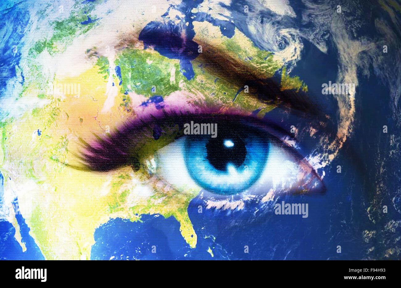 Planet Earth and blue human eye with violet day makeup. woman painting ...